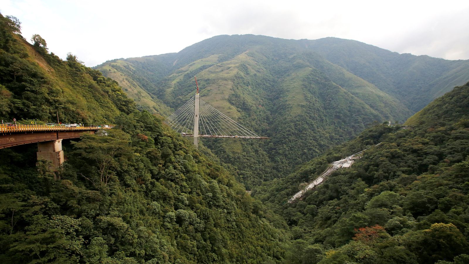 Colombia bridge collapses into canyon | World News | Sky News