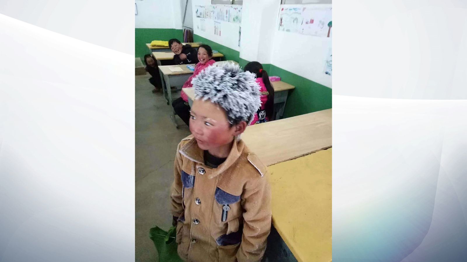 Photo of boy with hair that freezes on walk to school goes viral ...