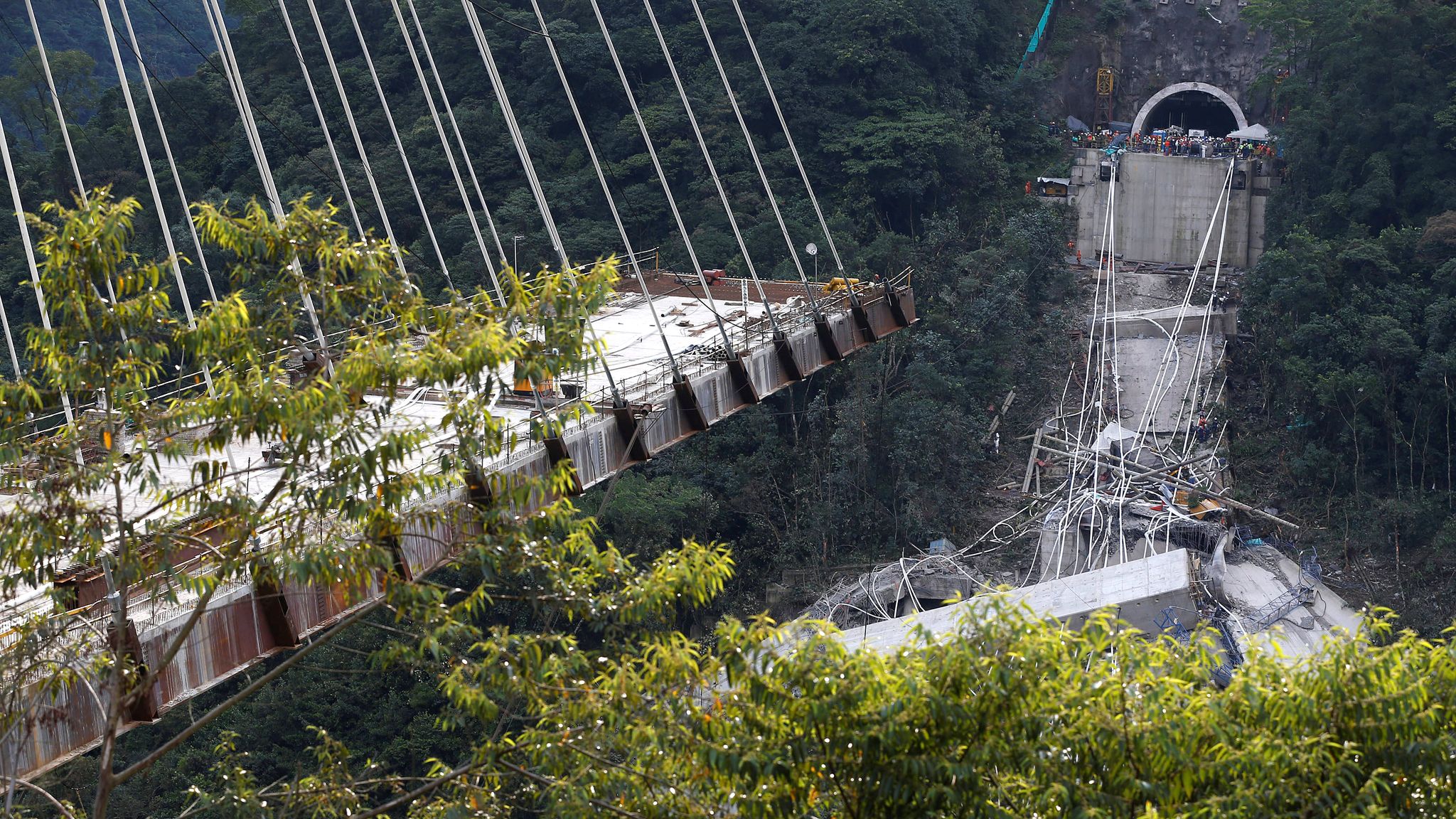 Colombia bridge collapses into canyon | World News | Sky News
