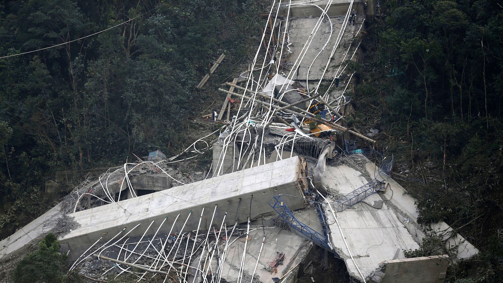 Colombia bridge collapses into canyon | World News | Sky News
