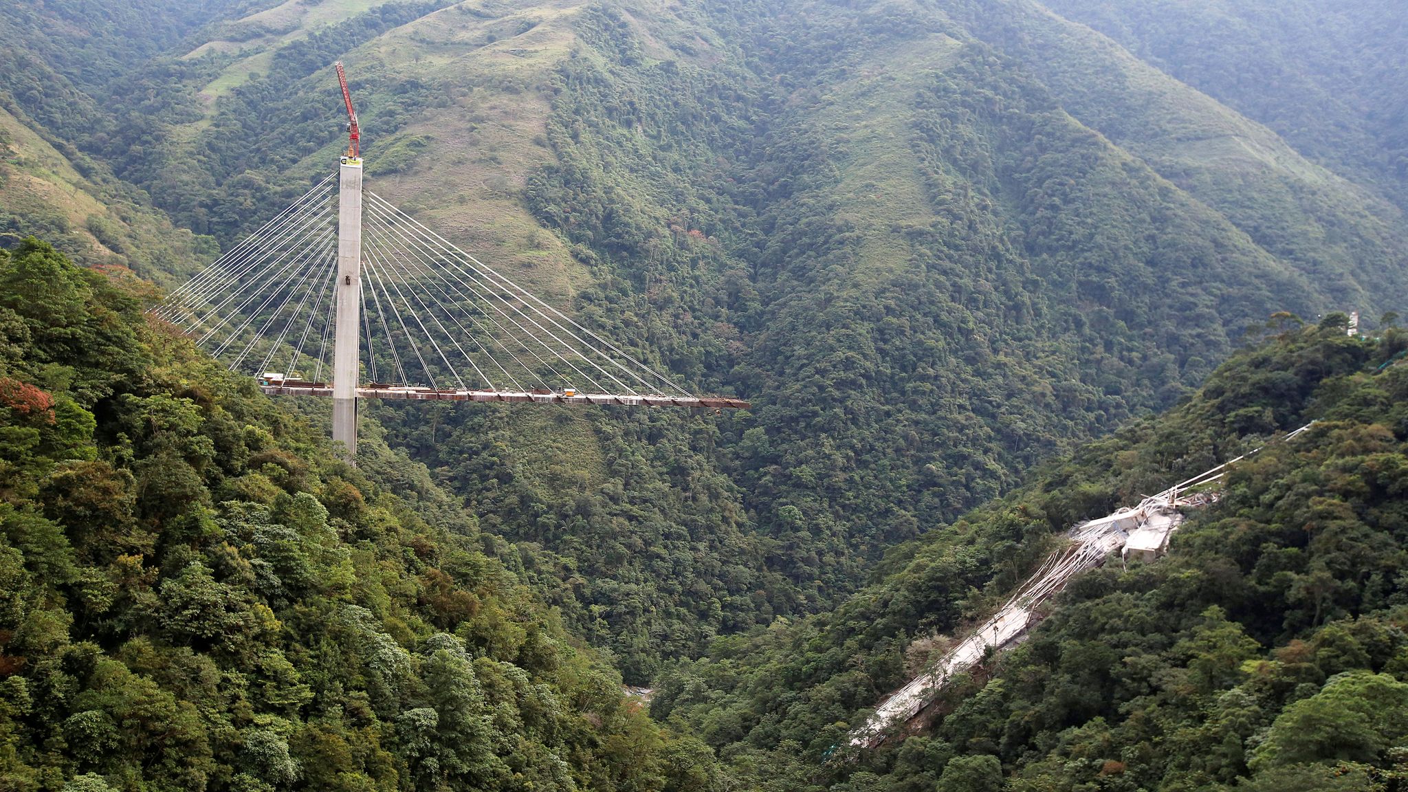 Colombia bridge collapses into canyon | World News | Sky News