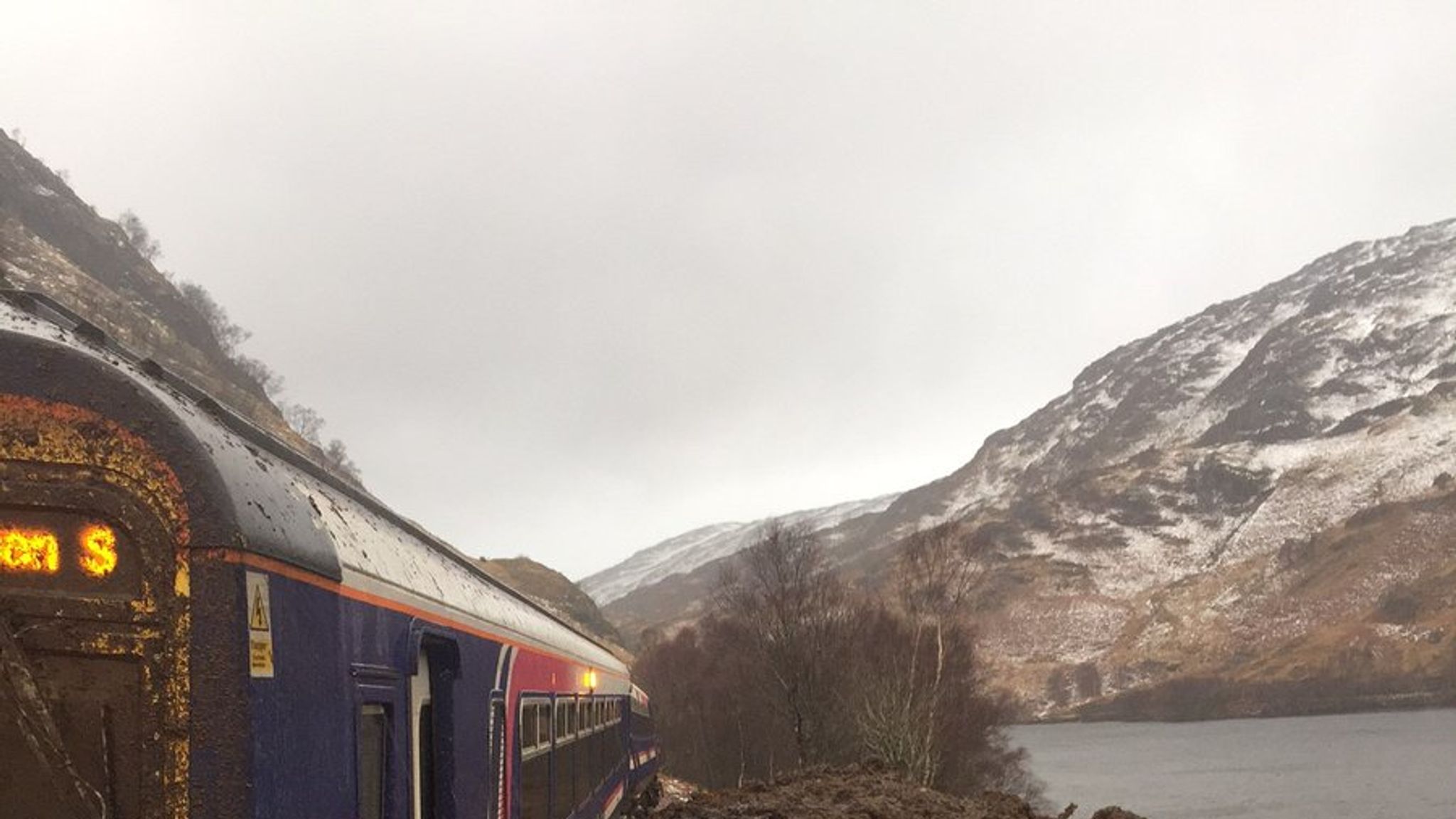 Train stuck after landslip in Scottish Highlands seen from the air | UK ...