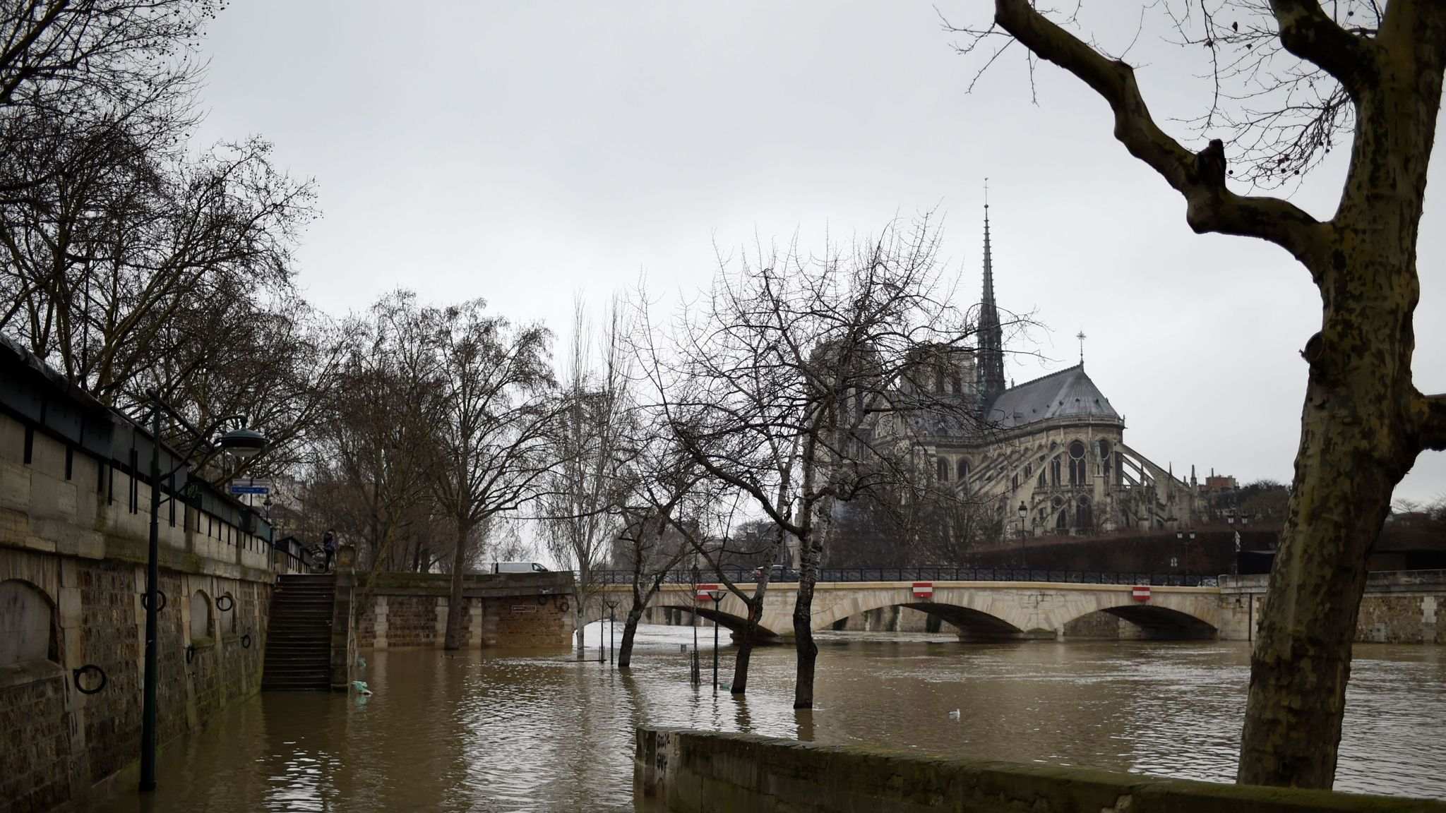 Paris flooded as Seine bursts its banks after days of heavy rain ...