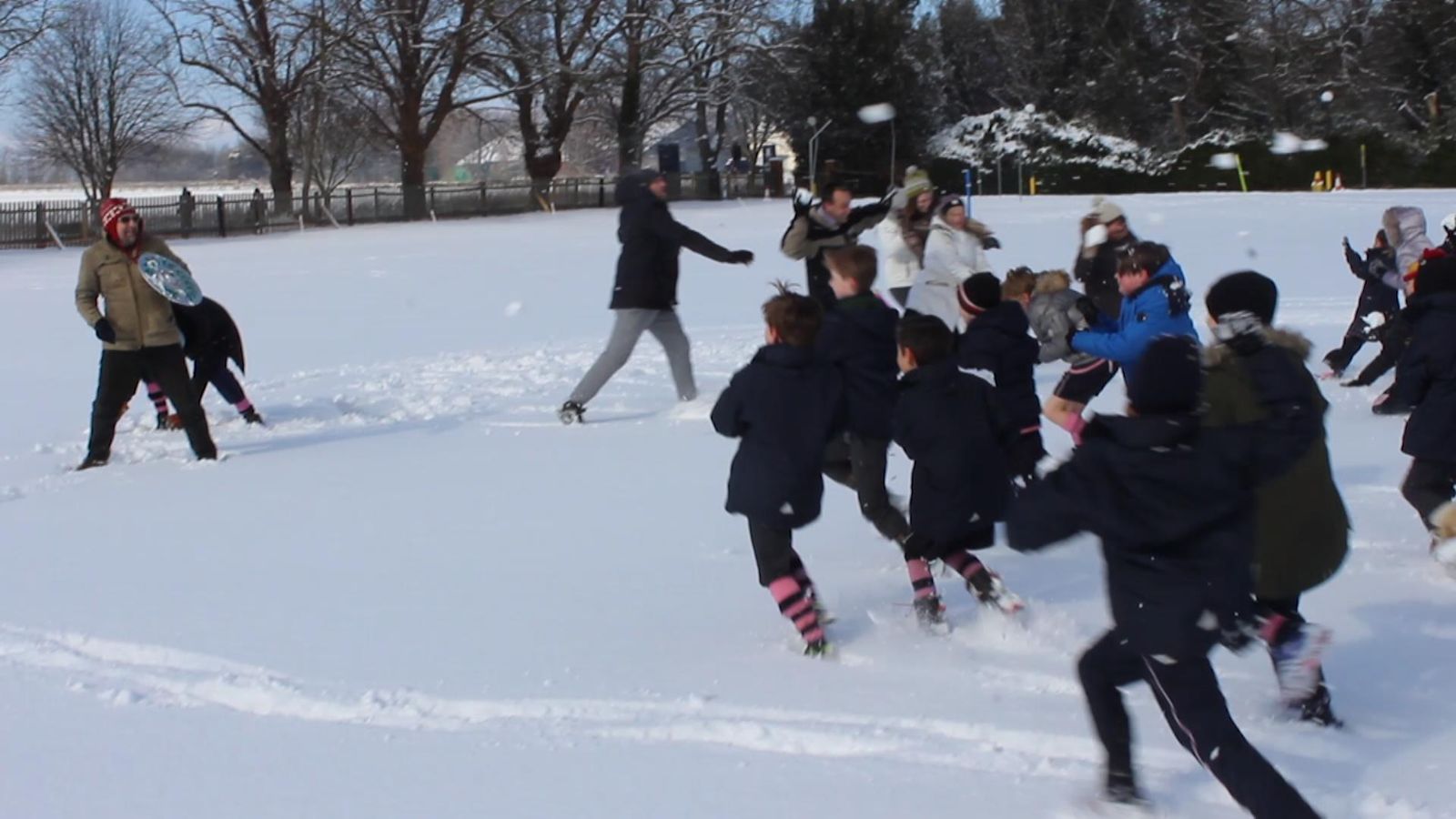 Pupils take on teachers in snowball fight | News UK Video News | Sky News