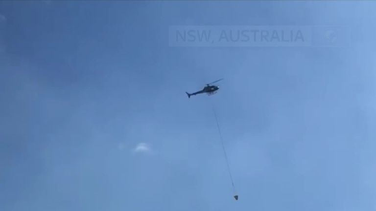 Helicopter fights Australia fires | News UK Video News | Sky News