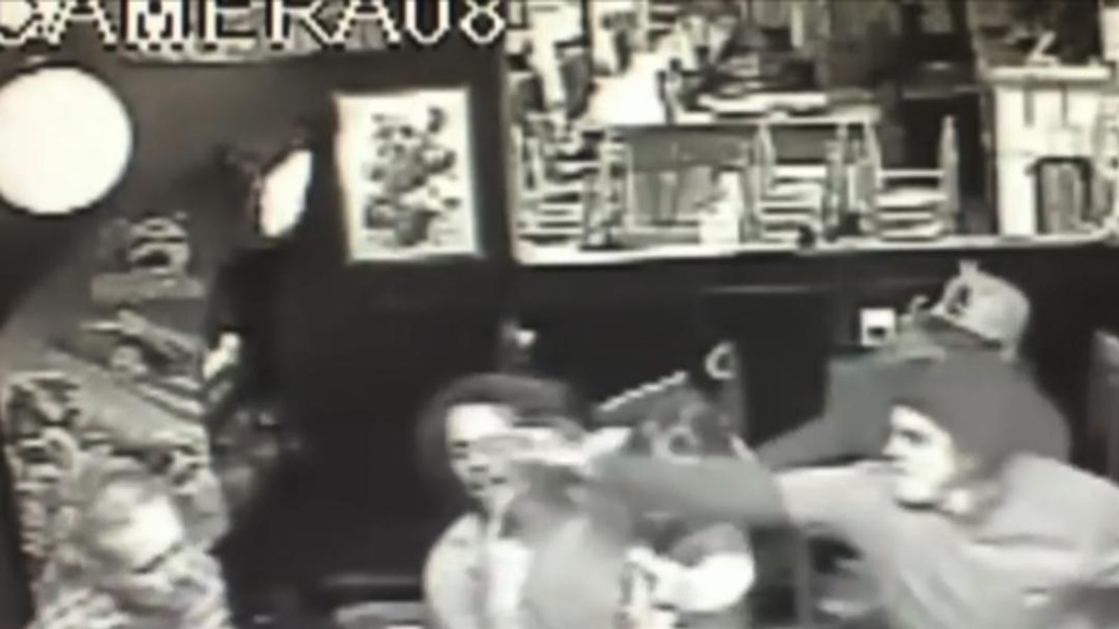 Dad holds child while fighting in bar | News UK Video News | Sky News
