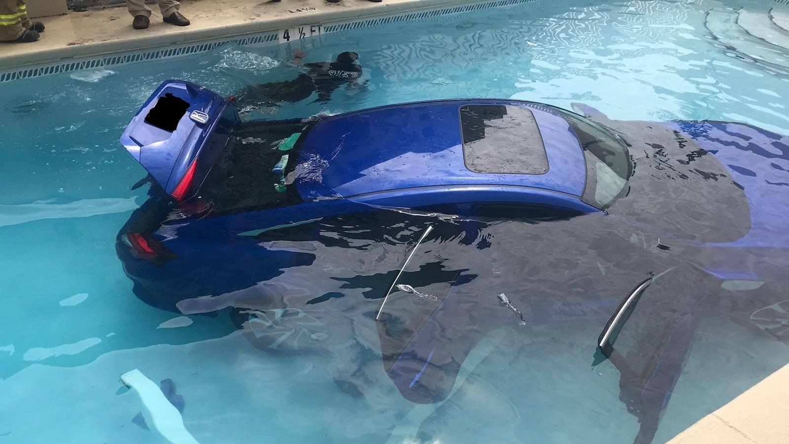 Florida mum's car rolls back into swimming pool with husband and ...
