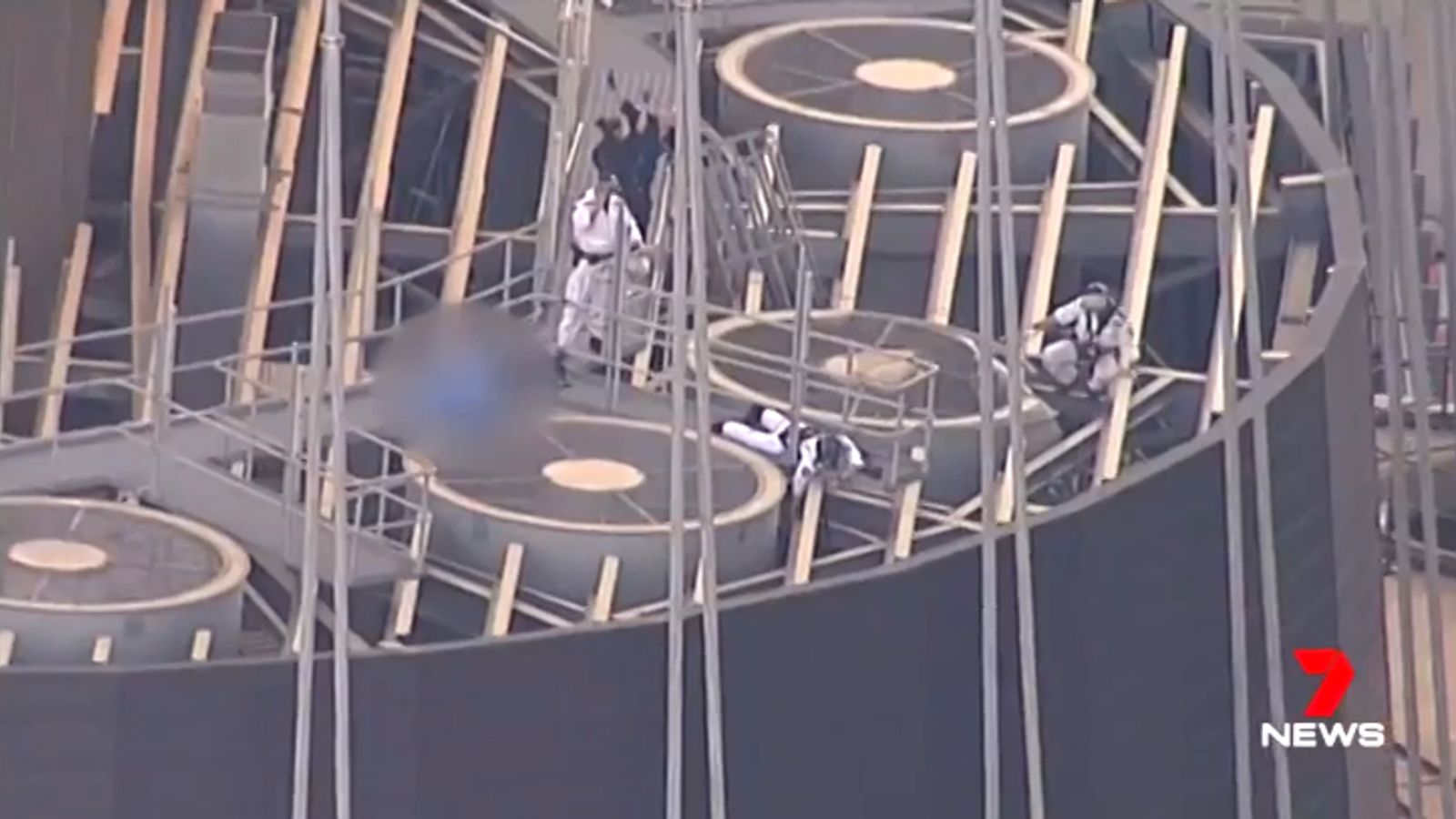 Woman dies after 'undoing safety harness and jumping' from Sydney Tower ...