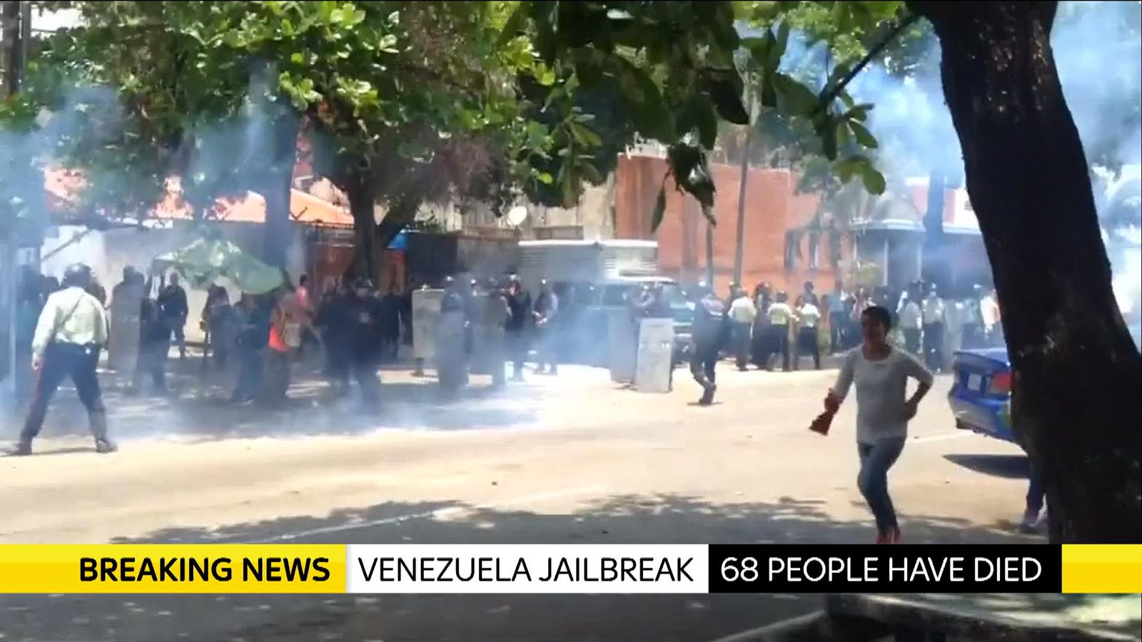 Families tear-gassed as 68 prisoners die in fire at jail in Venezuela ...