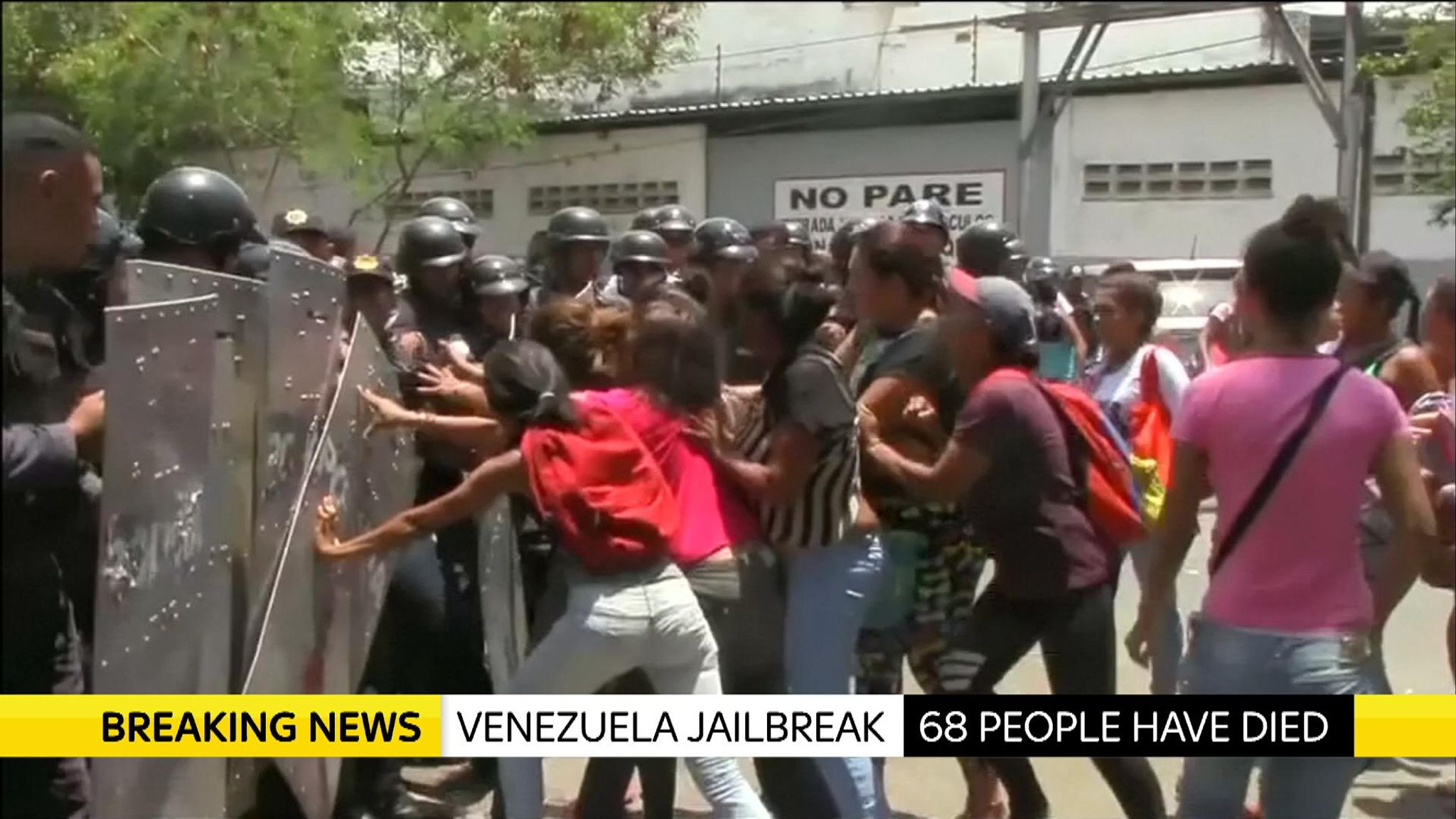 Families tear-gassed as 68 prisoners die in fire at jail in Venezuela ...