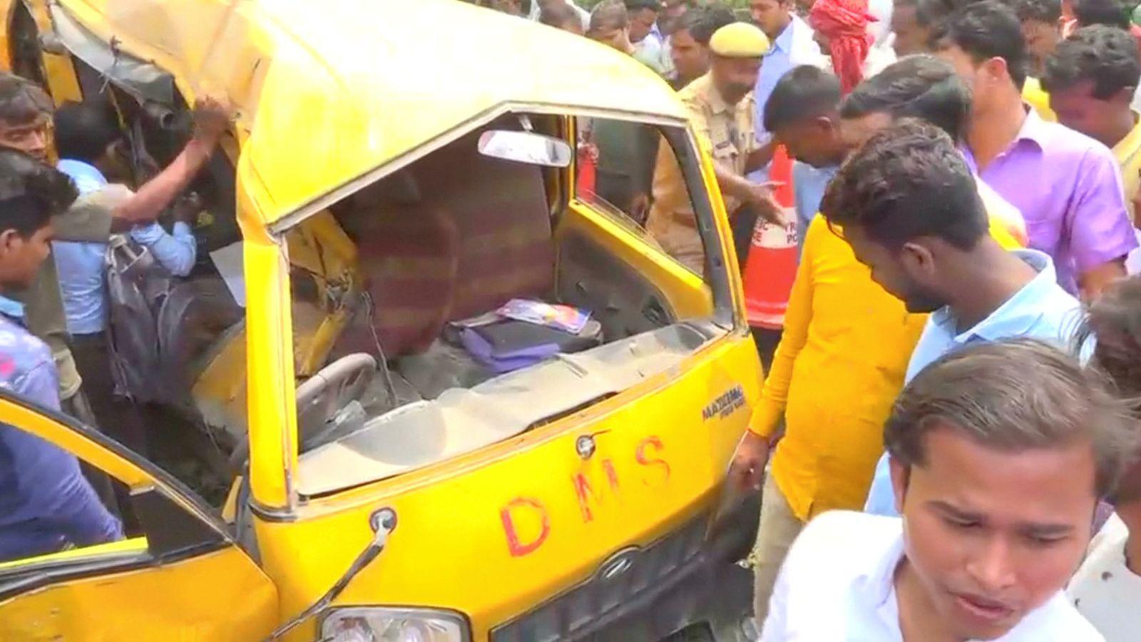 India bus crash: Thirteen children die as school bus hit by train ...