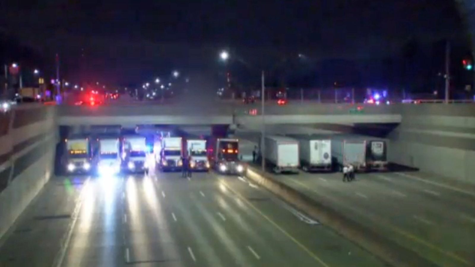 Lorries park under bridge to help suicidal man | US News | Sky News