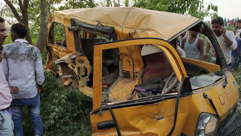 India bus crash: Thirteen children die as school bus hit by train ...