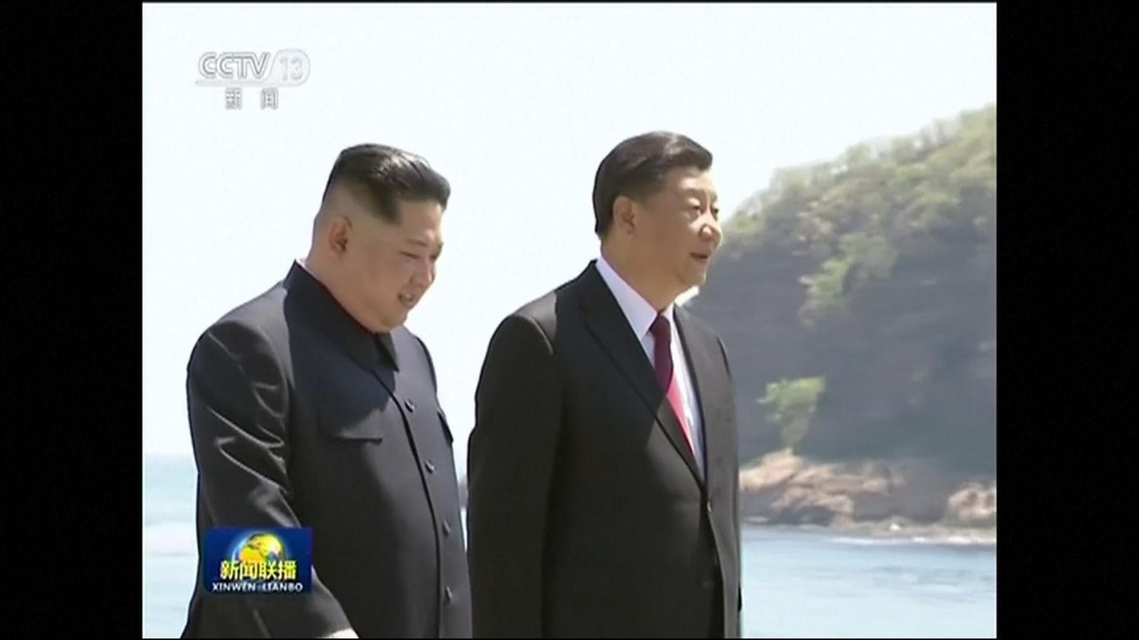 Kim Jong Un strolls along seaside with President Xi Jinping in China ...