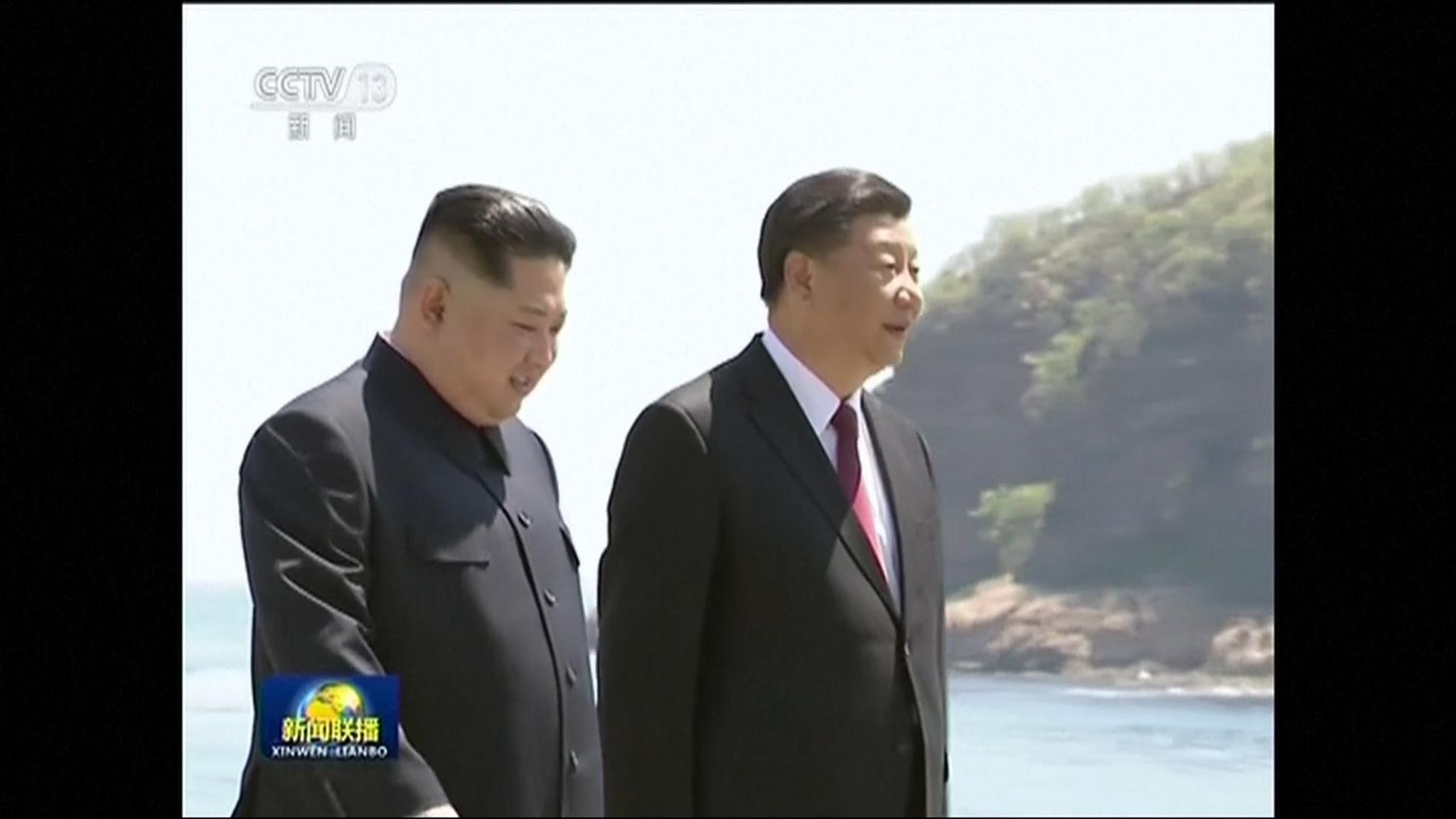 Kim Jong Un strolls along seaside with President Xi Jinping in China ...