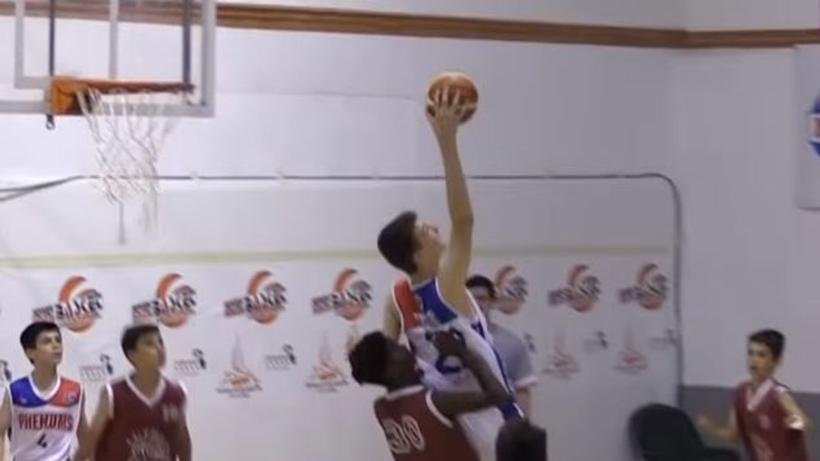 Twelve-year-old super tall basketball star dominates court | World News ...