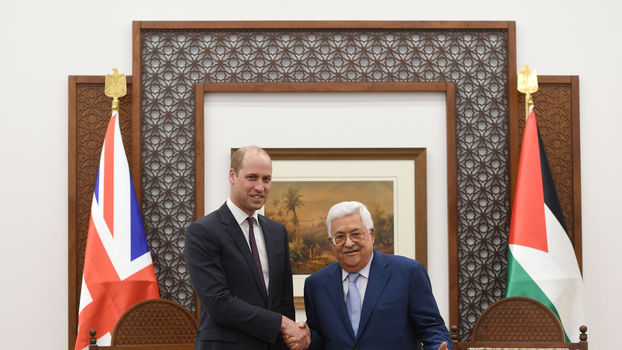 Prince William and Palestinian President Mahmoud Abbas shake hands in ...