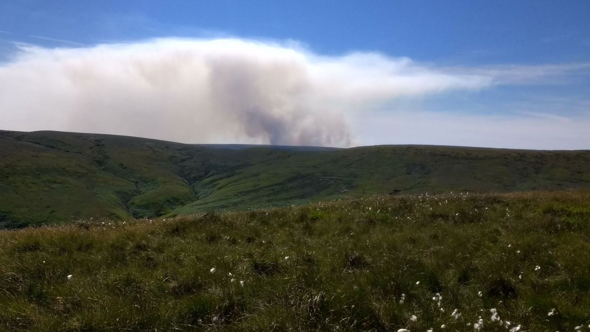 Warm weather reignites wildfires across Saddleworth Moor | UK News ...