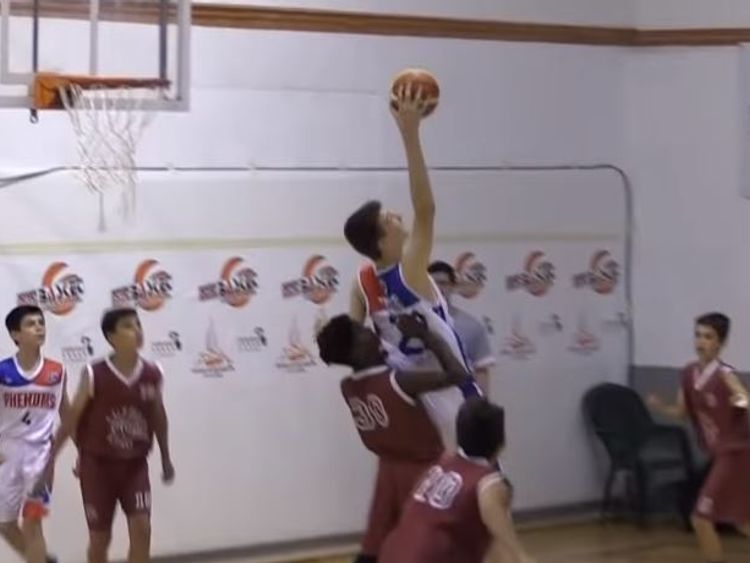 Twelve-year-old super tall basketball star dominates court