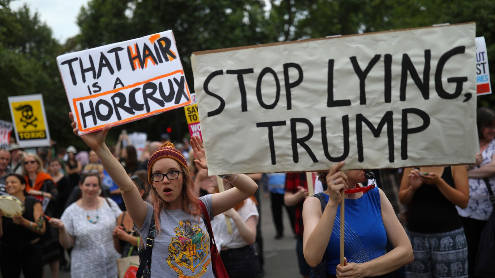 13 very British signs at protests against Donald Trump | UK News | Sky News