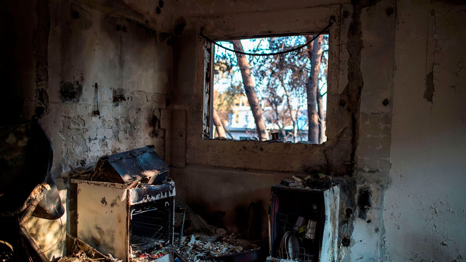 Greece fires leave trail of desolation in village of Mati | World News ...