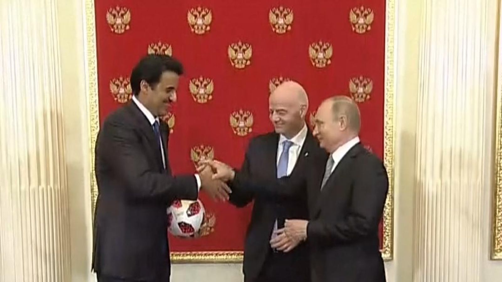 Awkward handshake as Putin hands World Cup over to Qatar | News UK ...
