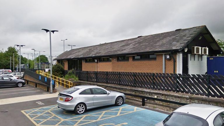 Father criticised after image of his son dangling head over train ...
