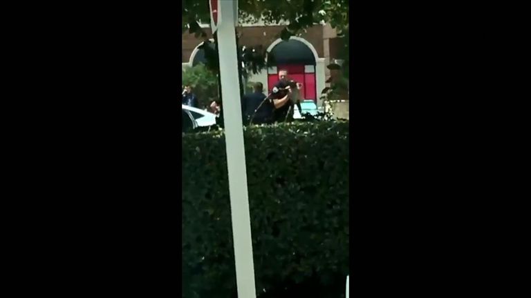 'Human shield' baby rescued from bank robber by police | US News | Sky News