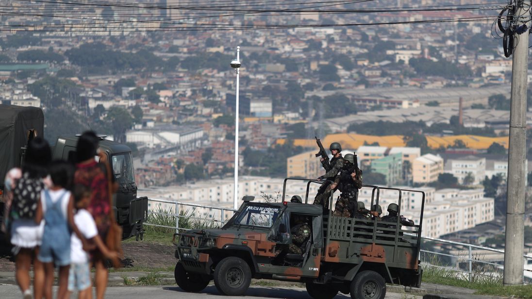 At least 14 dead in Brazil after raids on Rio de Janeiro drug gangs