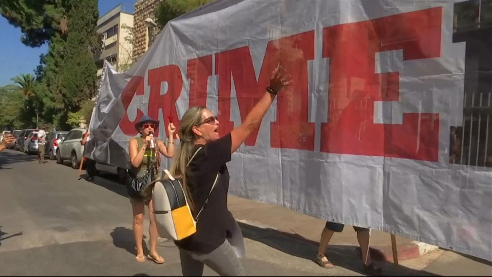 Israeli PM Benjamin Netanyahu questioned by police as protesters label ...