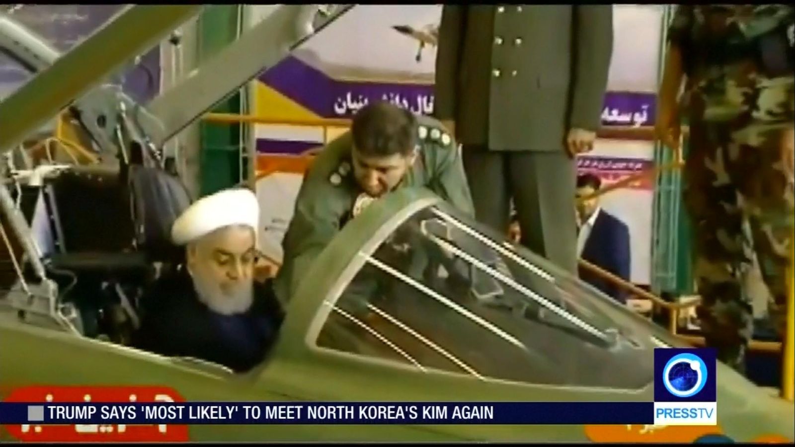 President Rouhani in the cockpit as Iran unveils new fighter jet ...