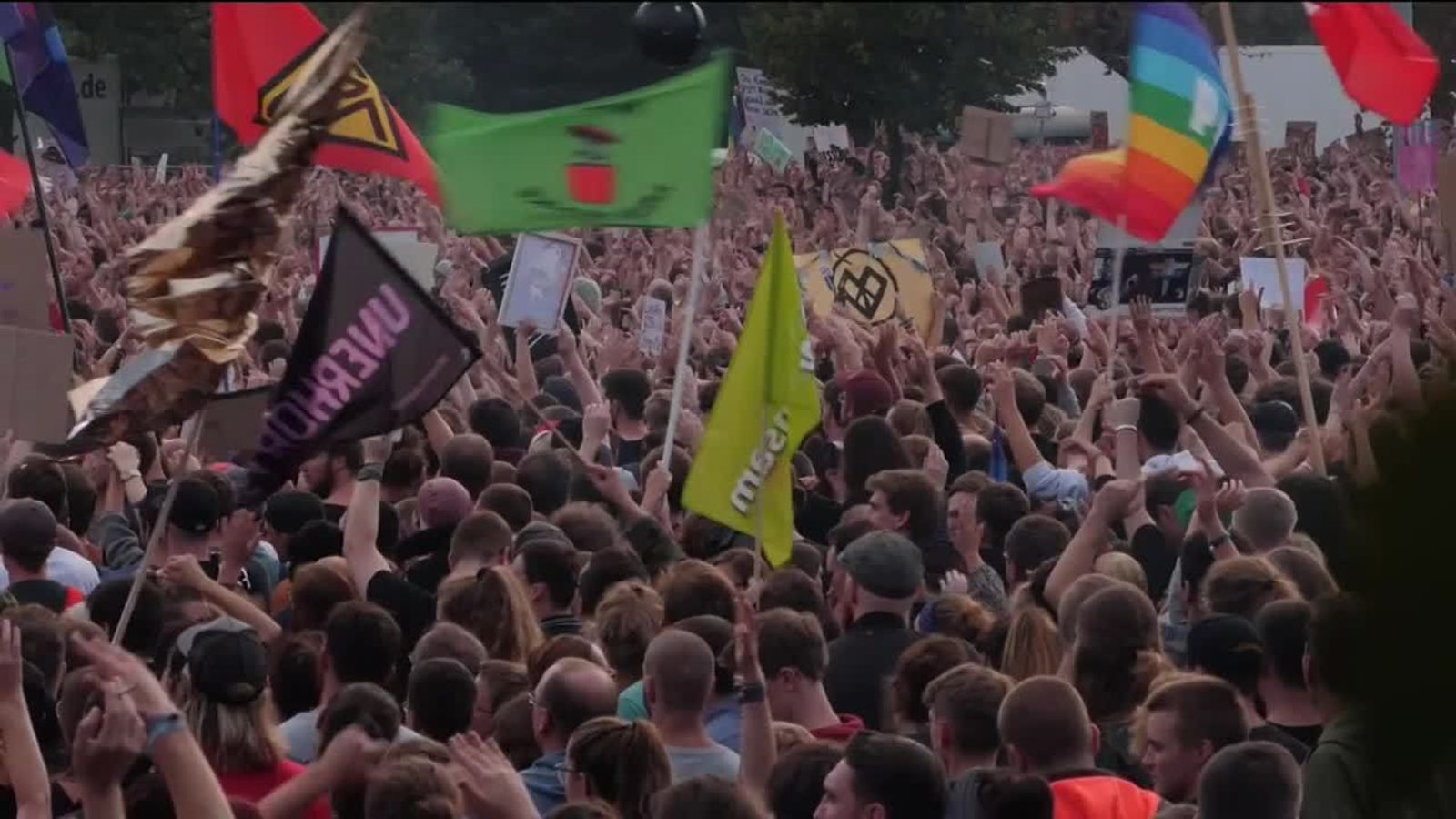 Tens of thousands attend anti-racism rally in divided town | World News ...