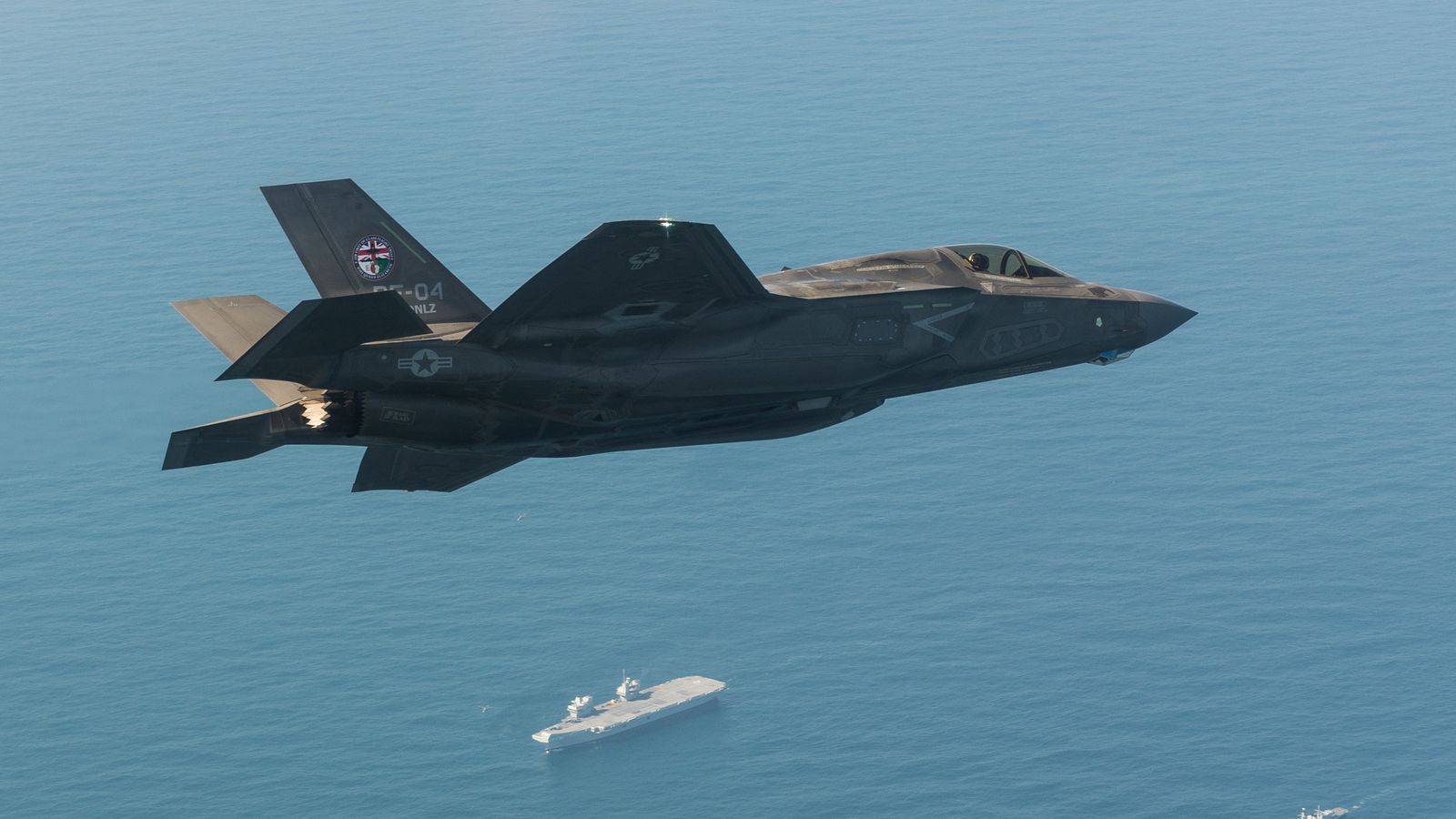 British fighter jets land aboard HMS Elizabeth in 'monumental moment ...