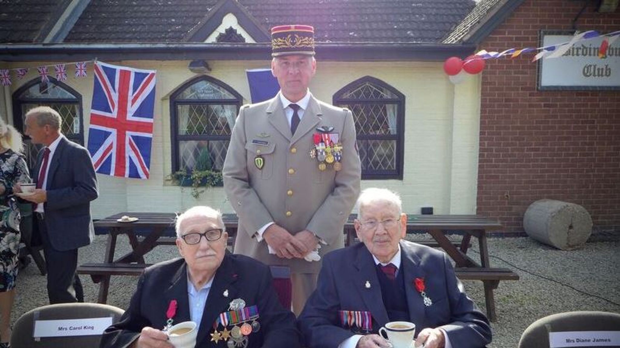 British D-Day veterans given France's highest honour | UK News | Sky News