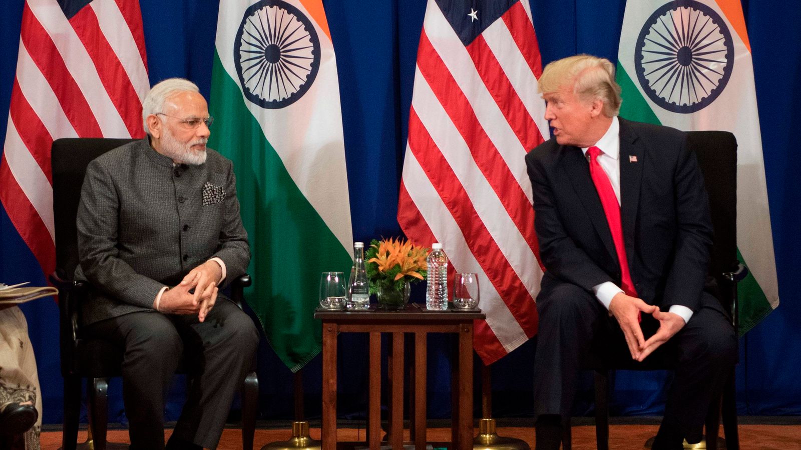 Putin and Modi exchange hugs as India signs Russia missile deal despite ...