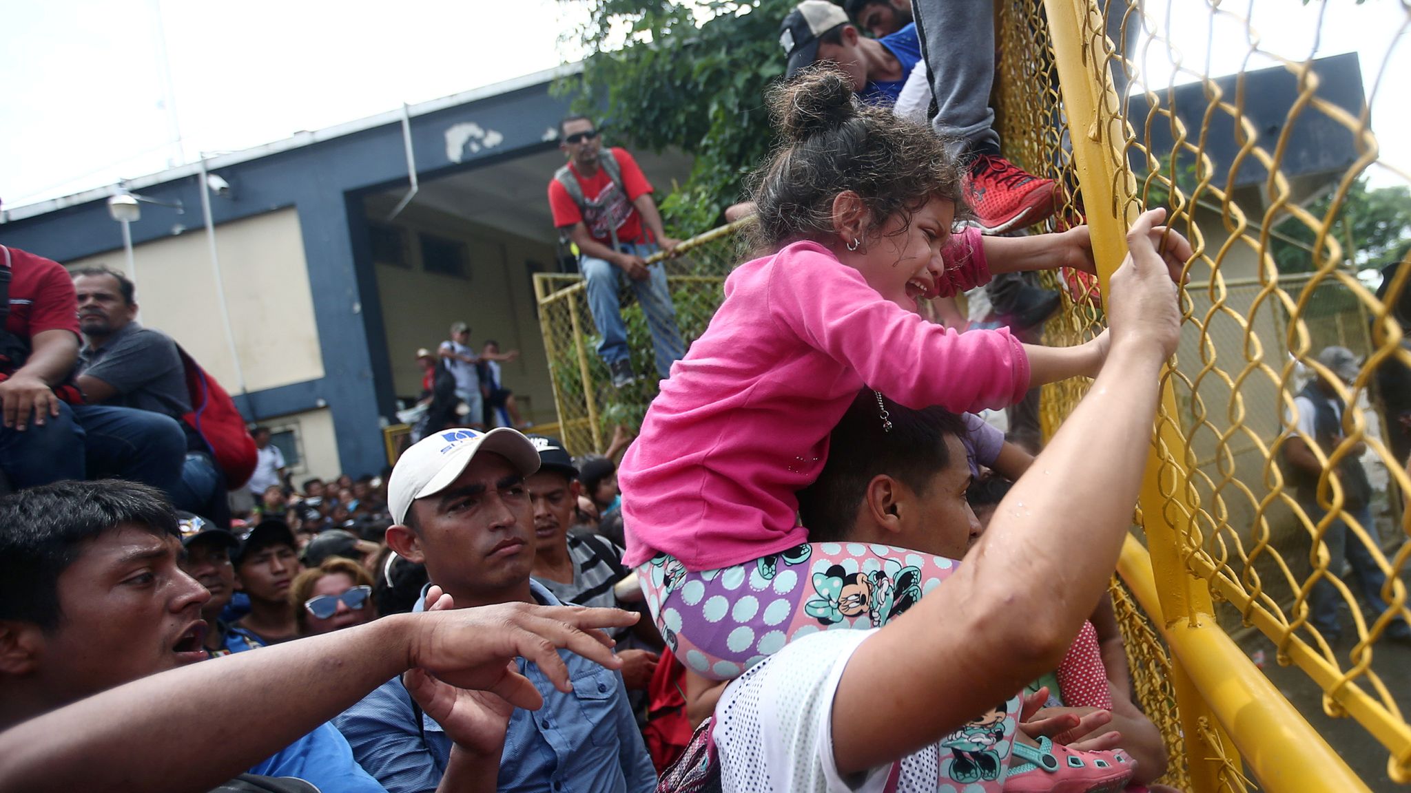Riot police clash with migrants desperate to reach US | World News ...