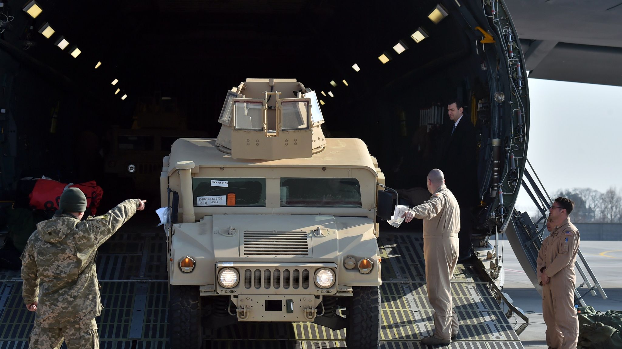 Humvee dropped from US plane lands in back garden - seven miles from ...