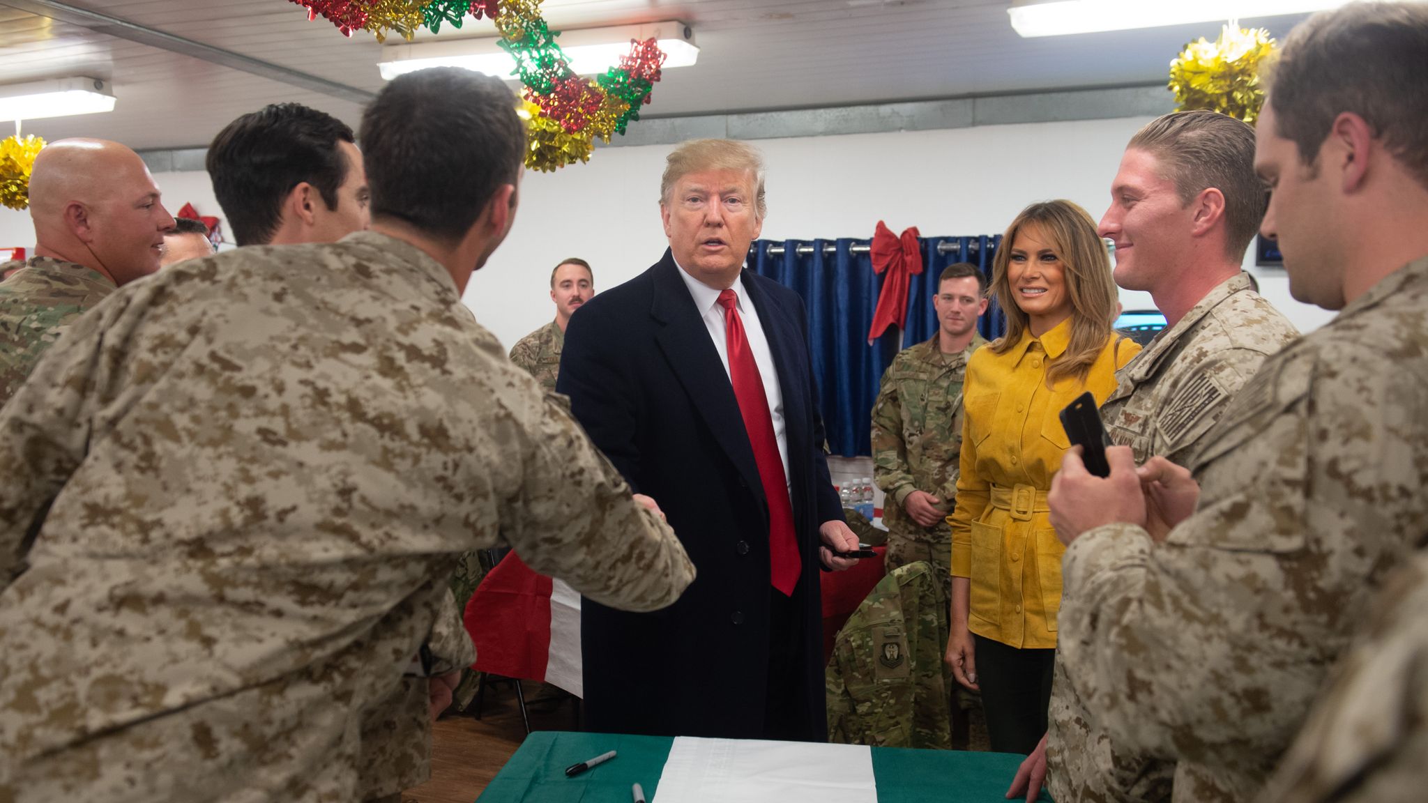 Donald Trump makes surprise visit to US troops in Iraq | US News | Sky News