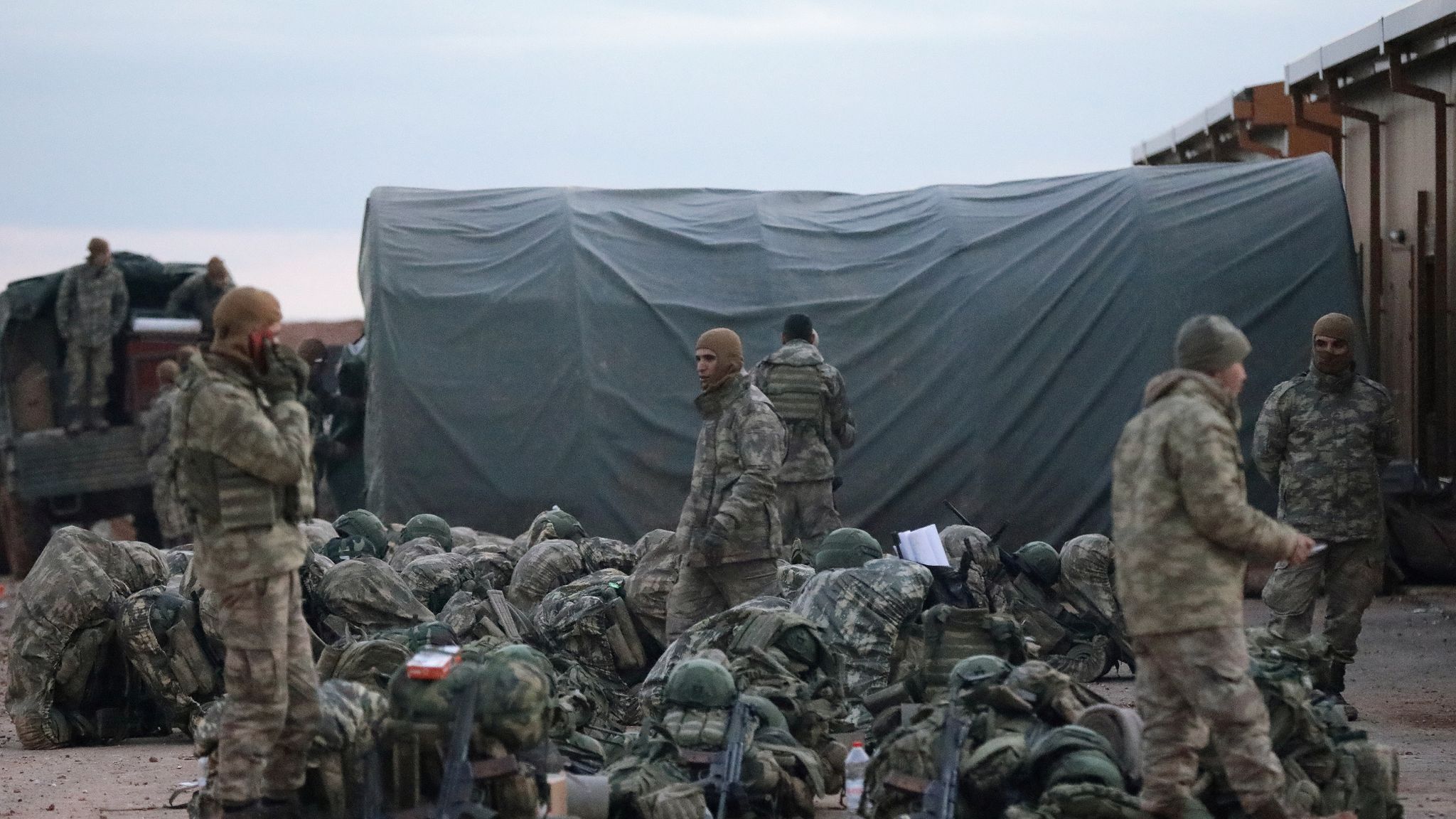 Syrian troops invited into Kurdish-held town as Turkey-backed forces ...