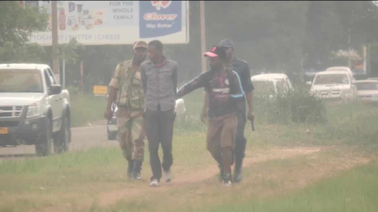 Security officials seen beating man in Zimbabwe | World News | Sky News