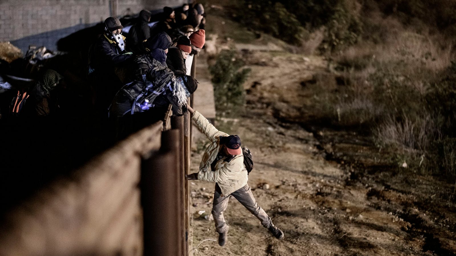 US border force fires tear gas at migrants crossing from Mexico | World ...