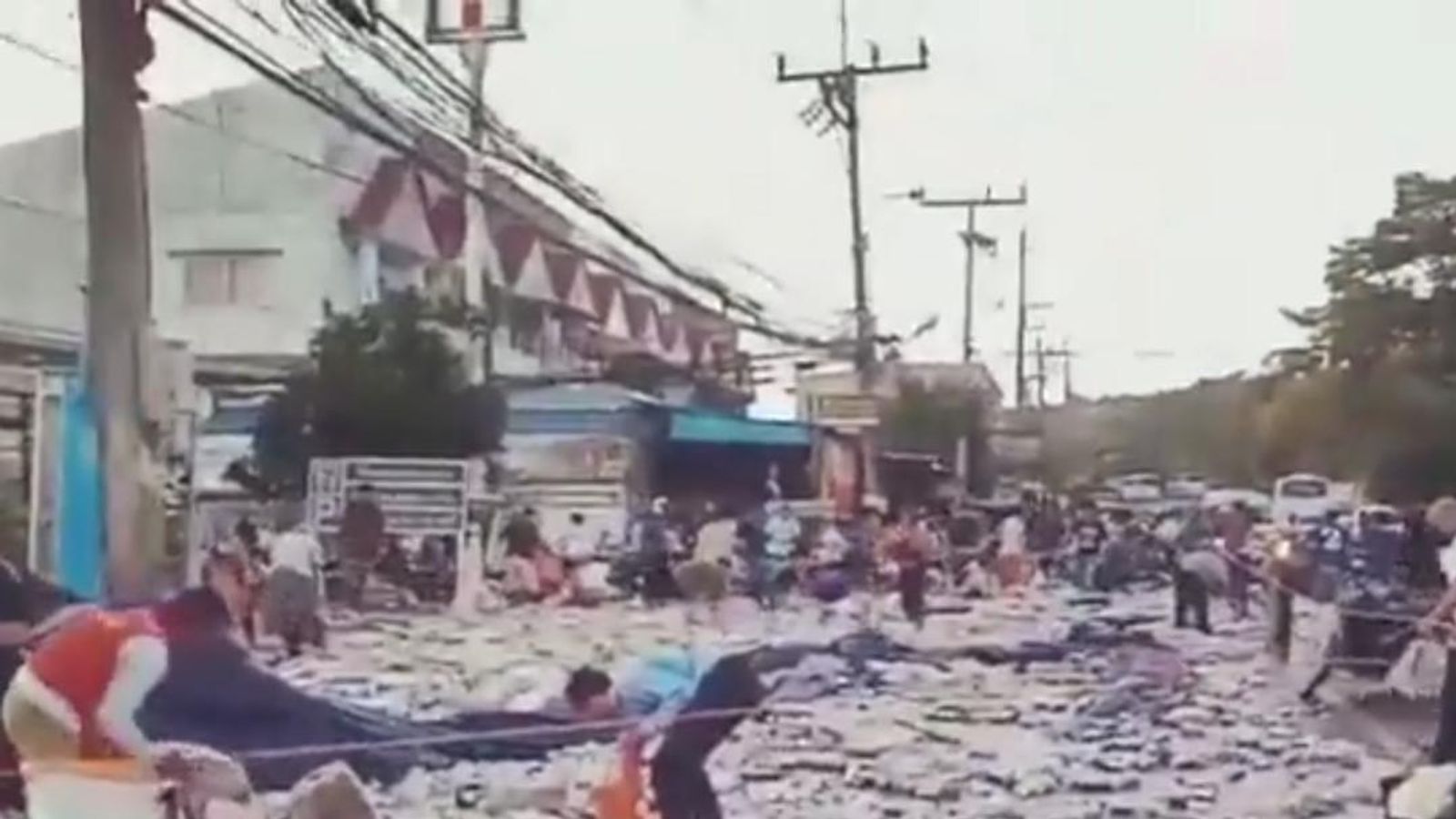 Chaos as beer cans are spilled over road in Thailand | World News | Sky ...