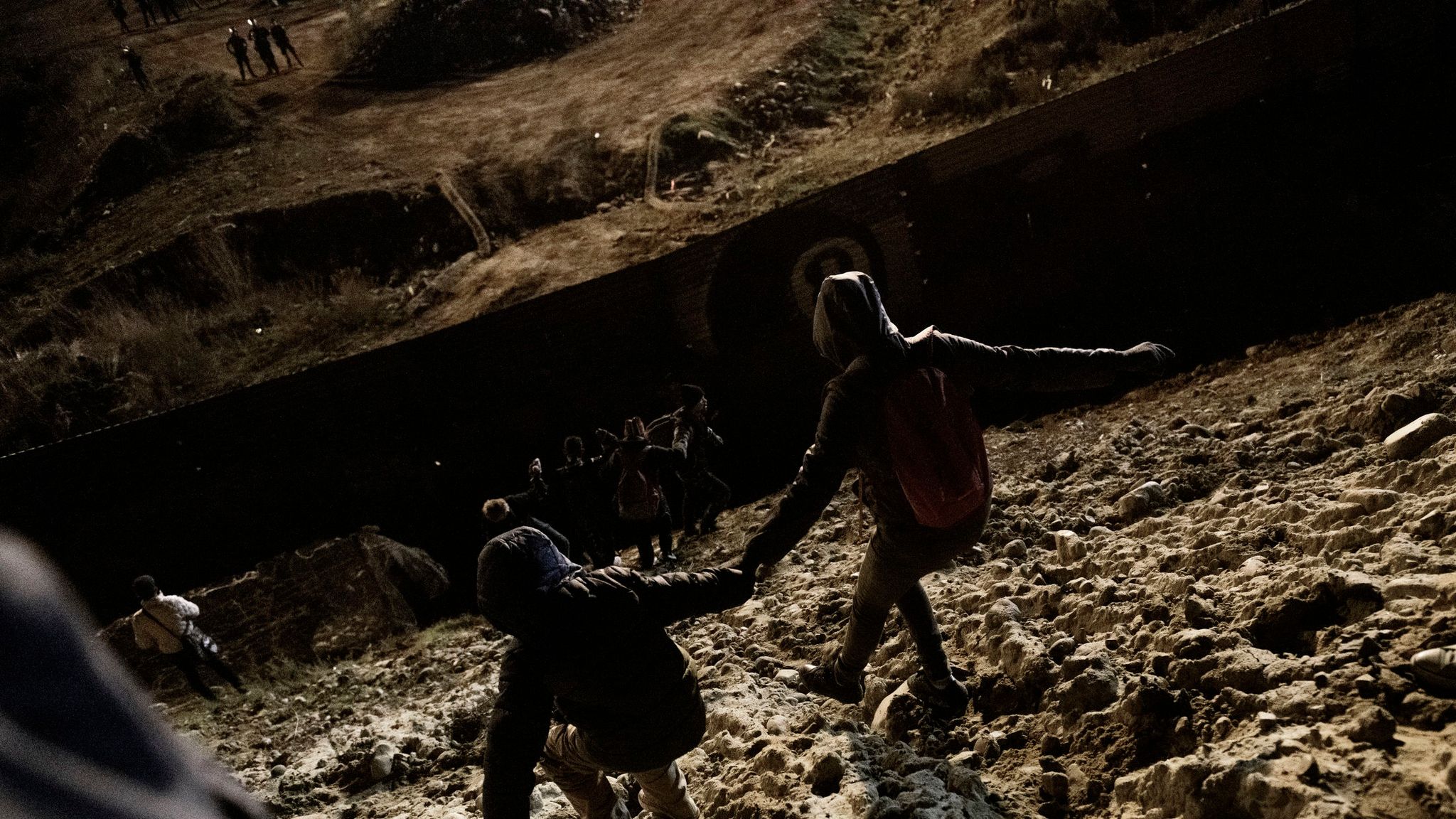 US border force fires tear gas at migrants crossing from Mexico | World ...