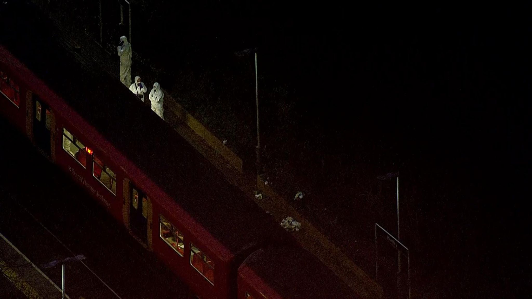 Surrey train murder: Man stabbed to death in front of 14-year-old son ...