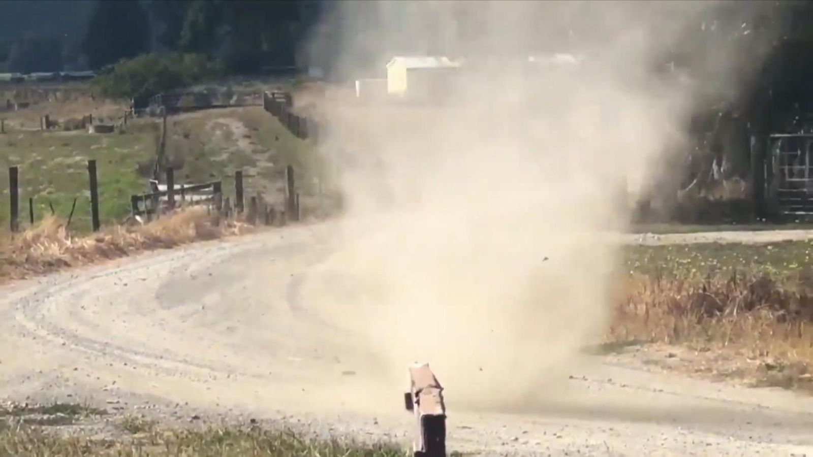 Dust devil whips along road in New Zealand | World News | Sky News