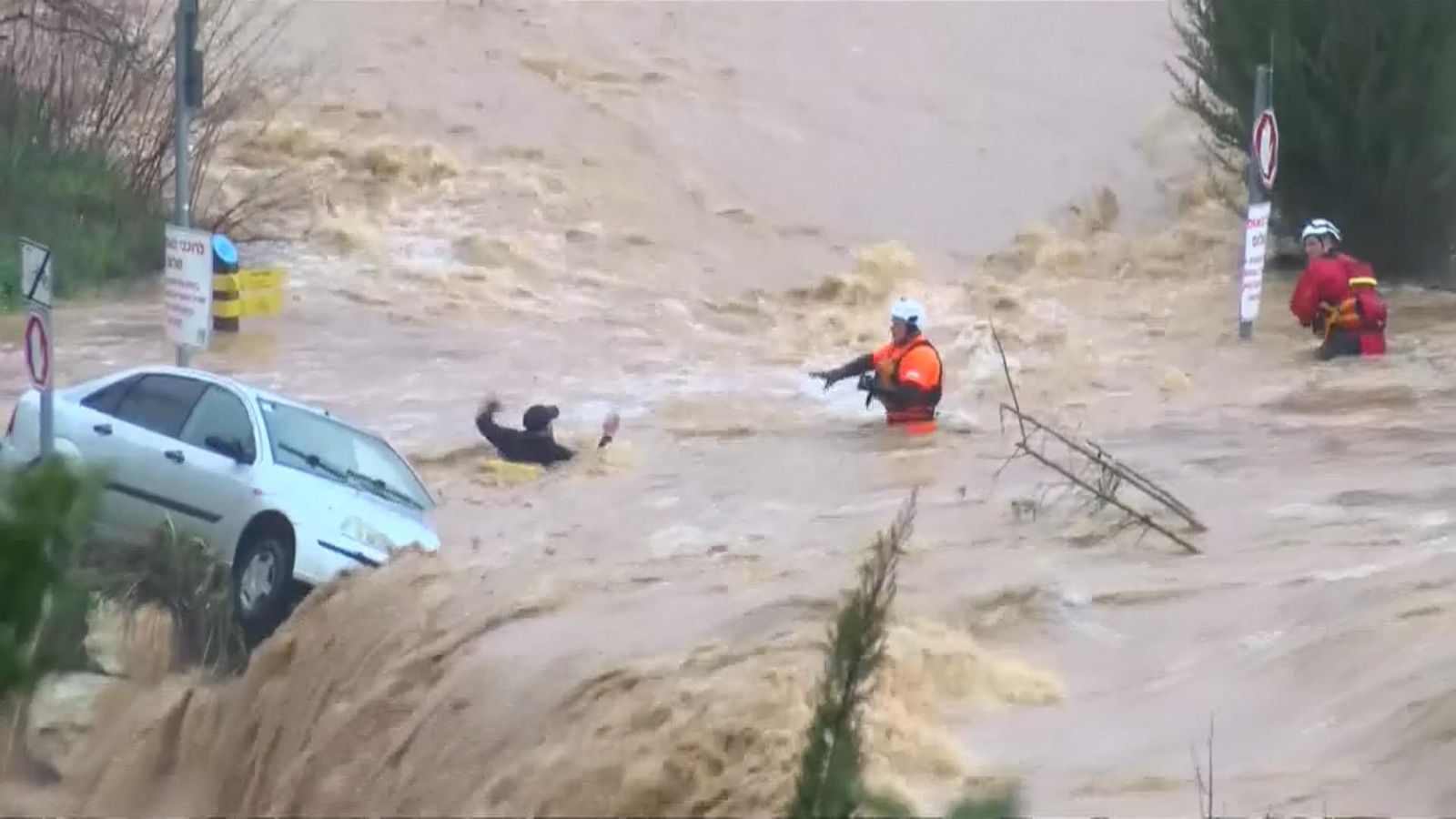 Man trapped on car rescued in Jerusalem flood | World News | Sky News