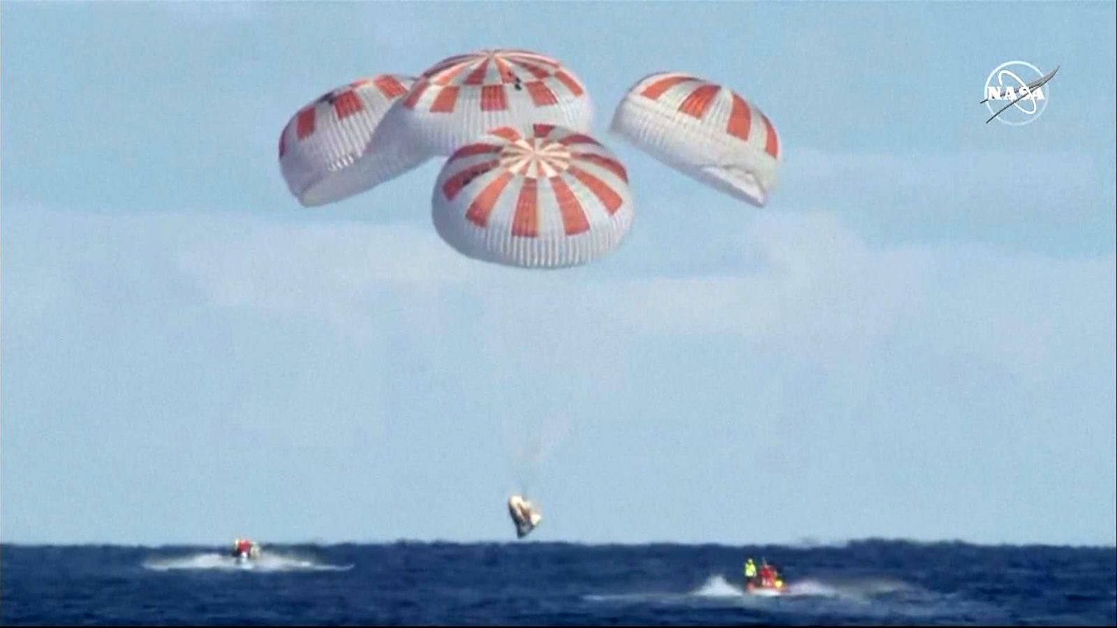 SpaceX capsule built for humans lands in Atlantic after space station ...
