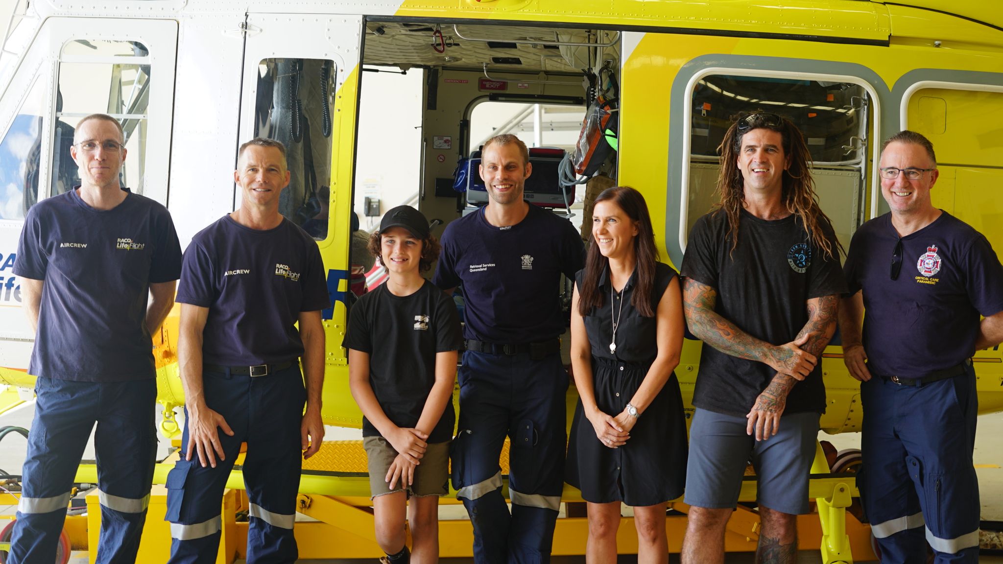 Boy crushed when fallen tree bounced back meets his rescuers | World ...
