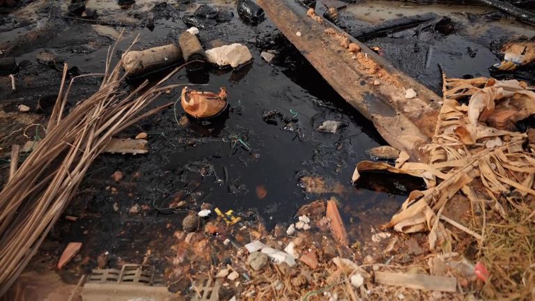 Leaking oil pipes poison fish and blacken water | World News | Sky News