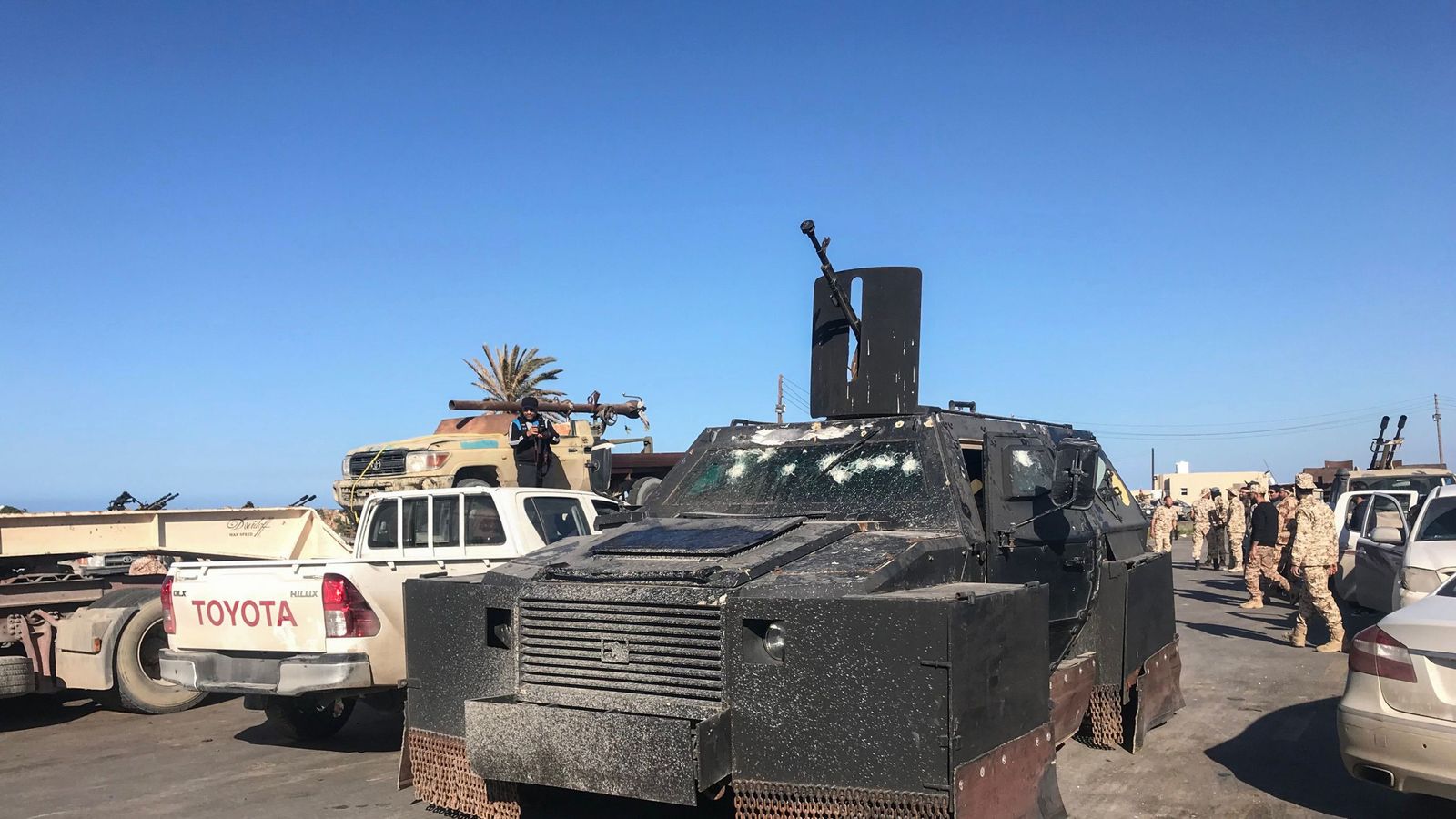 Libya: At least 25 killed as forces 'seize control of Tripoli ...